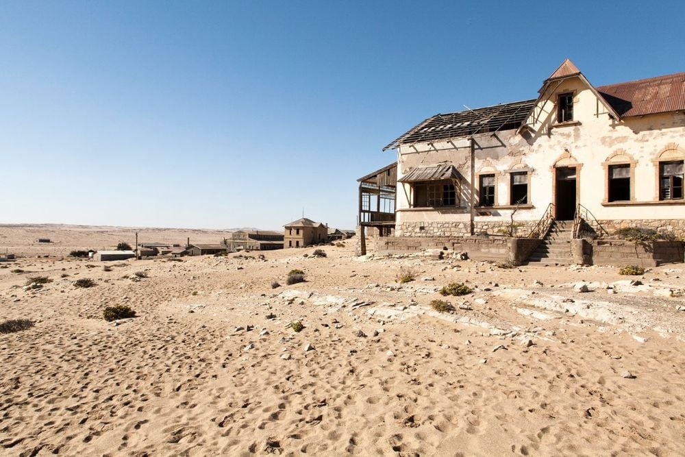 The Dark History of Kolmanskop - Namibia’s Abandoned Diamond Town